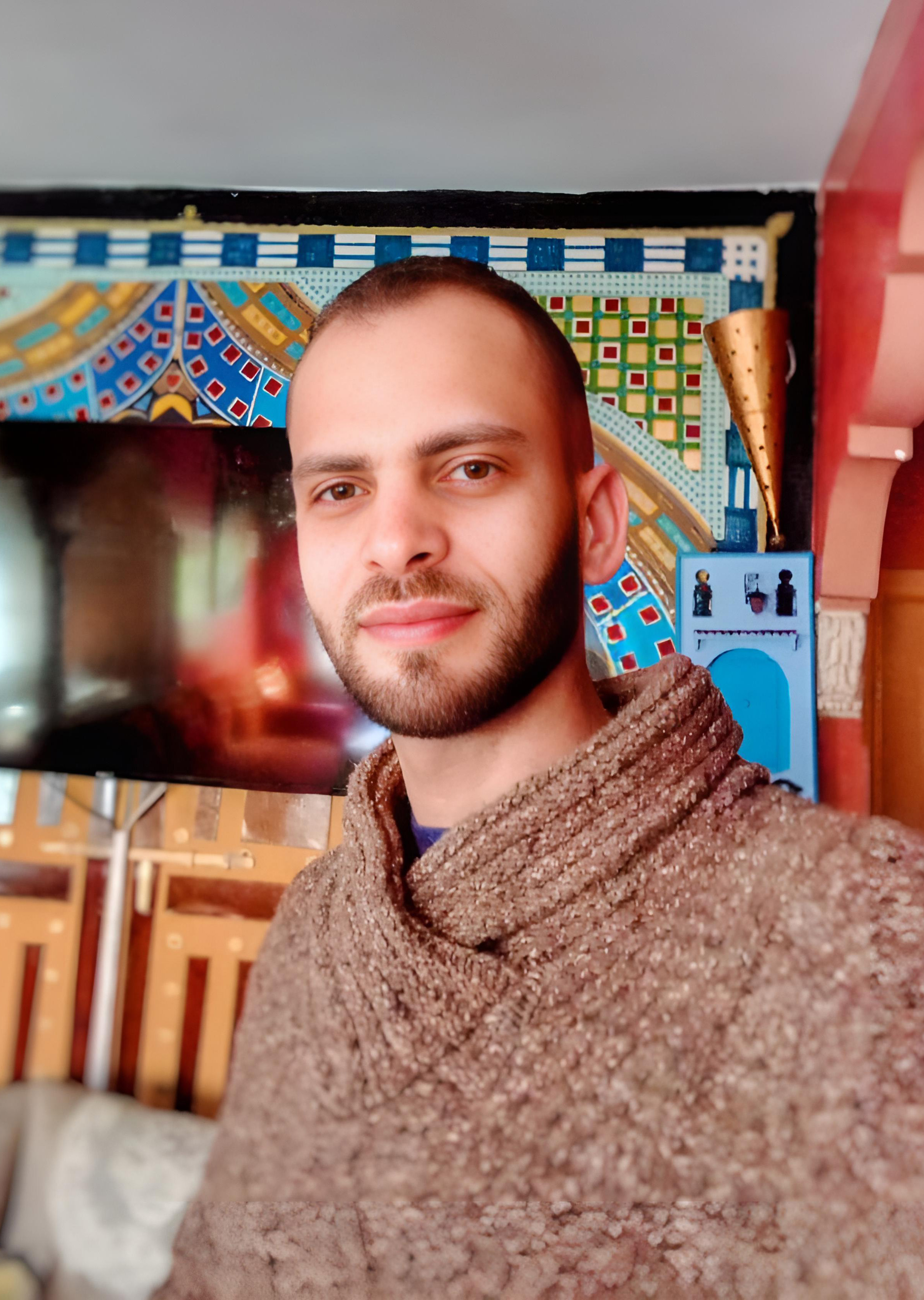 Omar Halloly | Amideast